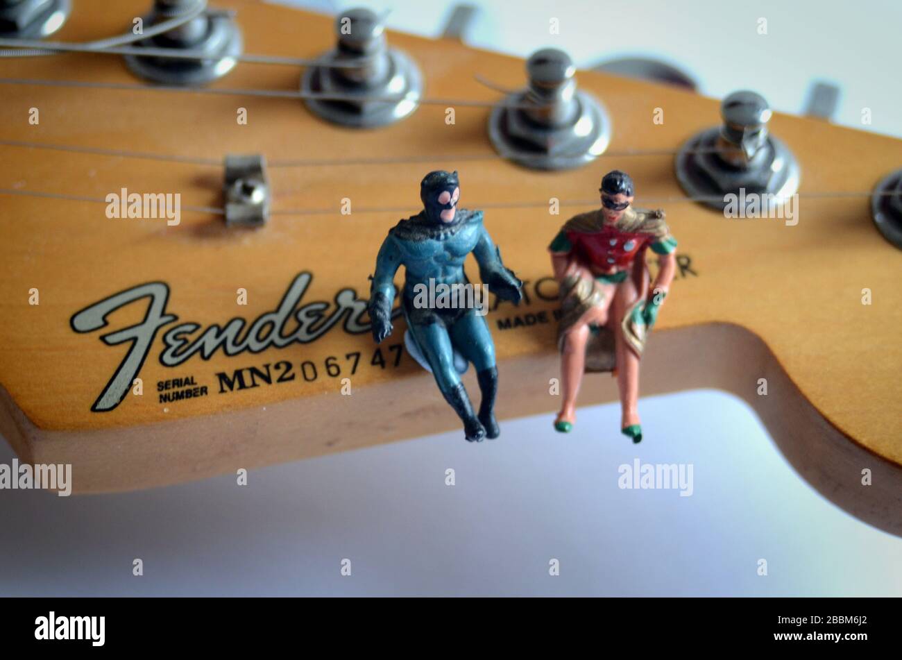 Batman & Robin with Fender Stratocaster Stock Photo - Alamy