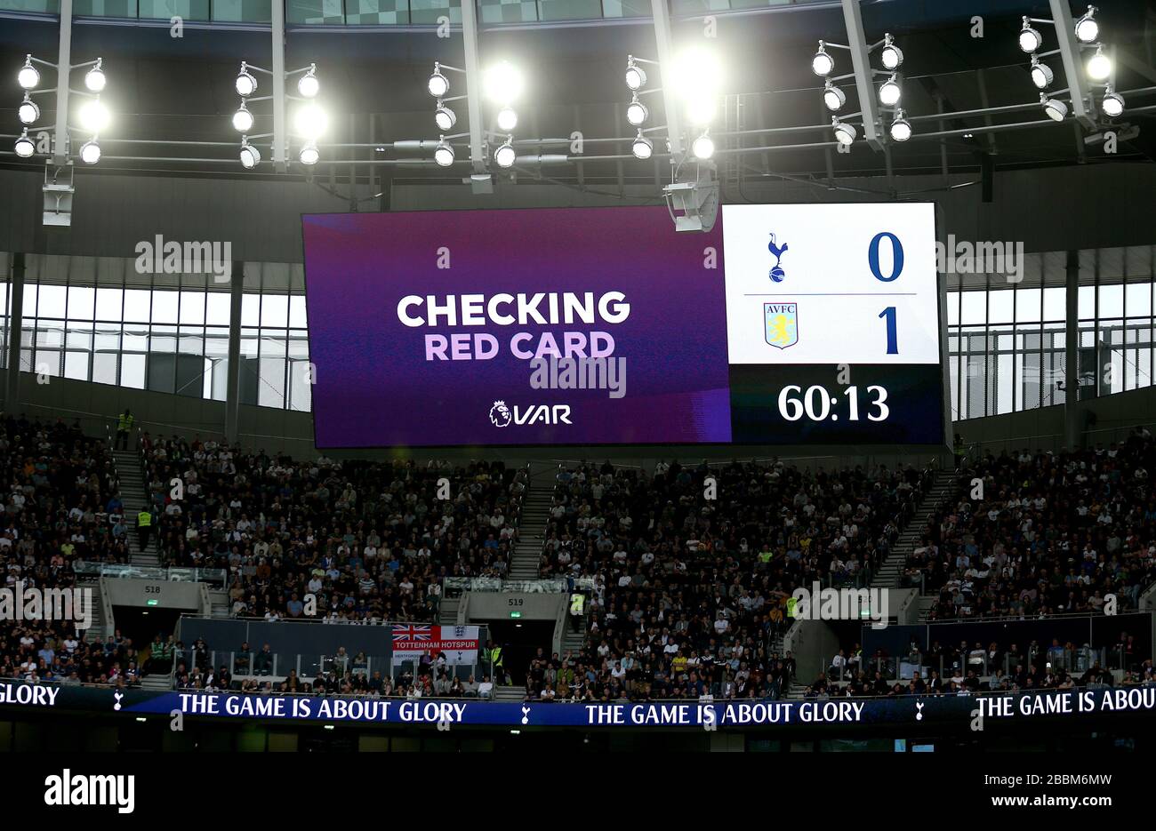 The big screen shows that VAR is checking for a red card on an incident ...