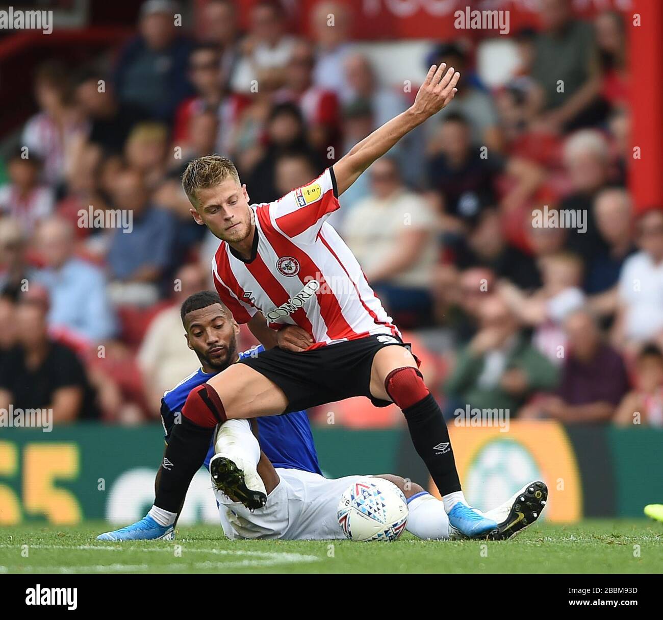 Birmingham City's David Davis (left) and Brentford's Mathias Jensen ...