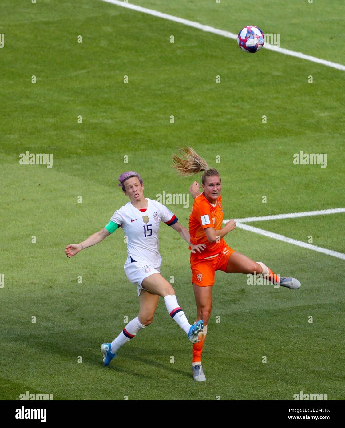 USA's Megan Rapinoe (left) and Netherlands' Desiree van Lunteren battle ...