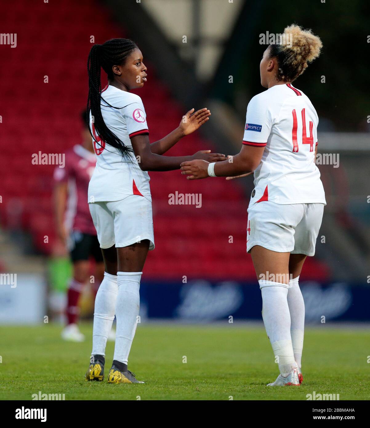 England's Jessica Naz (left) celebrates scoring her side's first goal ...