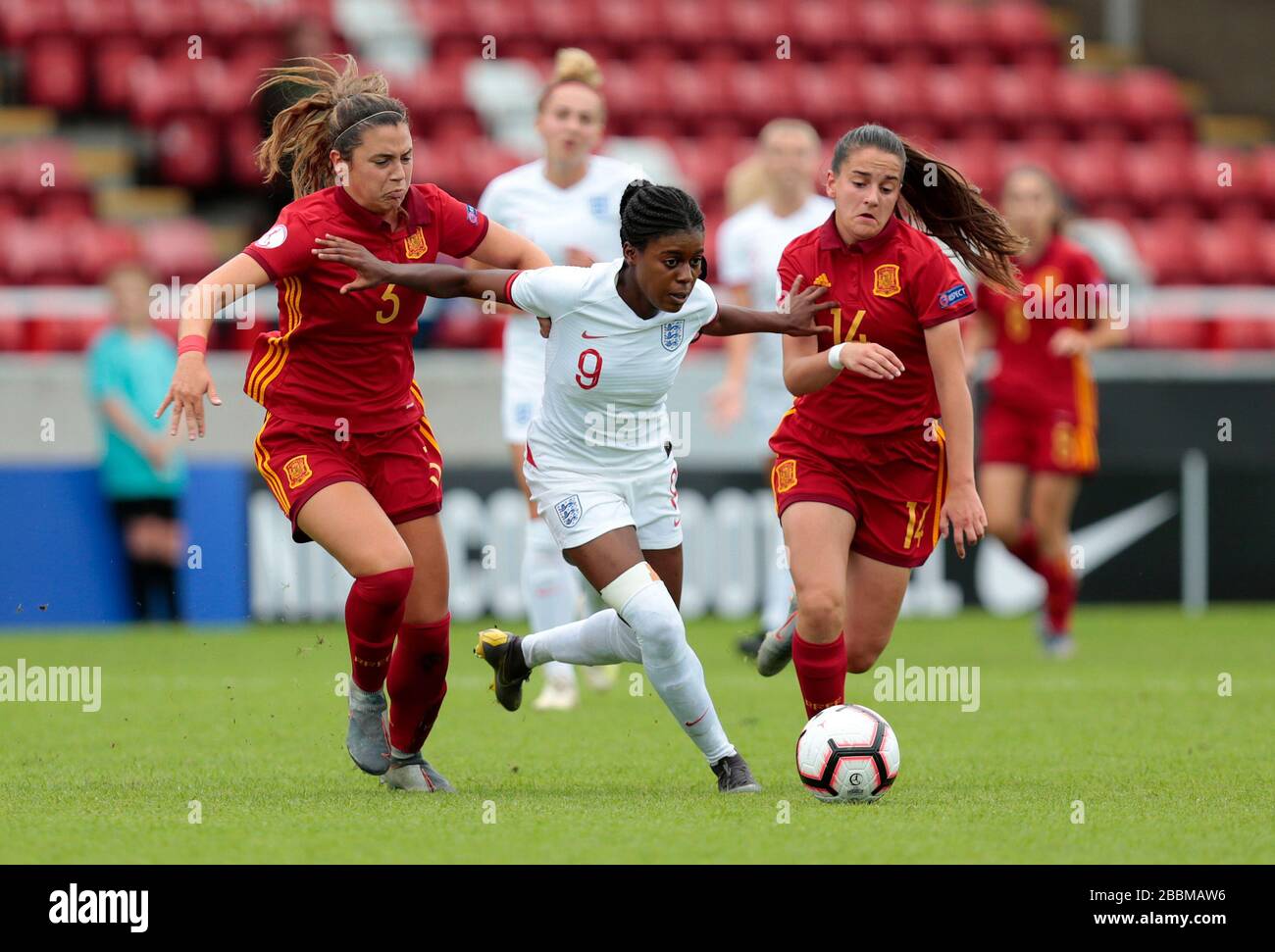 England's Jessica Naz (centre) battles for the ball with Spain's Berta ...