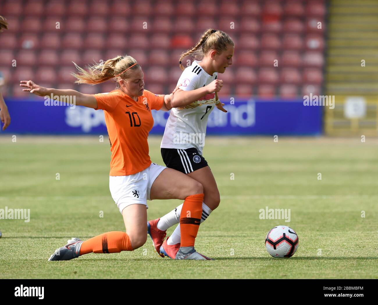 Netherlands Jill Baijings and Germanys' Leonie Koster battle for the ...