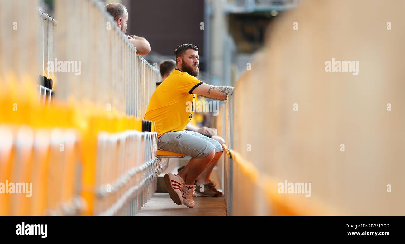 Wolves fans sit in the new safe standing area of Wolverhampton ...