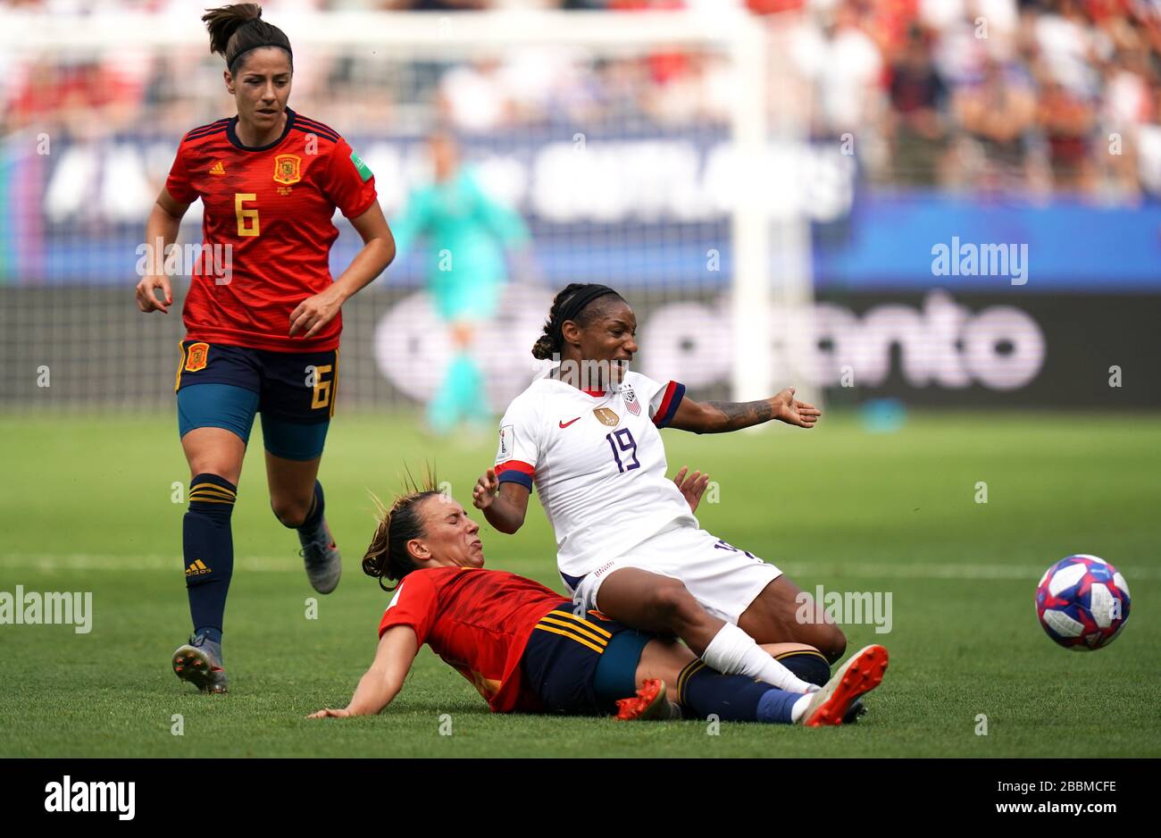 Spain's Virginia Torrecilla (centre) tackles USA's Crystal Dunn Stock ...