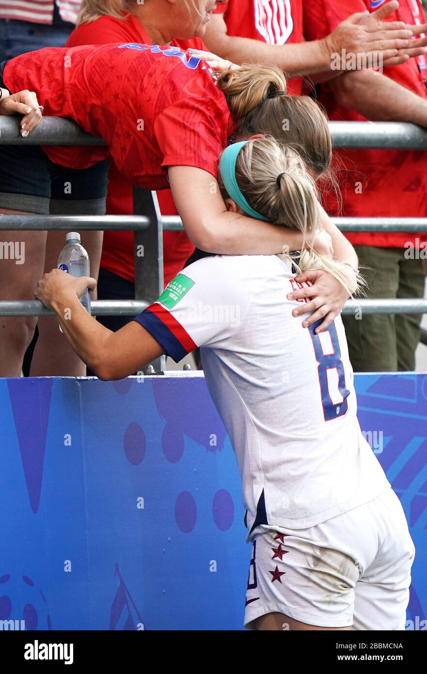 USA's Julie Ertz (right) hugs a family member after the final whistle ...