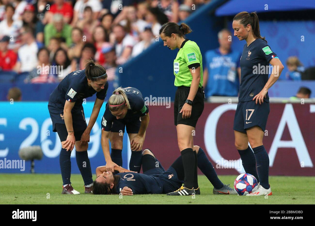 France's Amel Majri reacts on the floor Stock Photo - Alamy