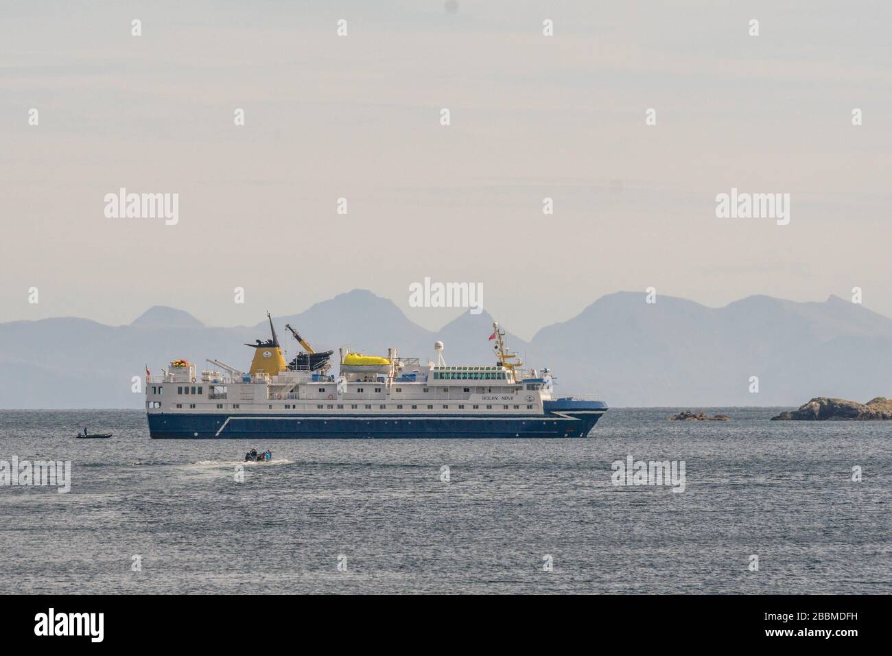 Cruise Ship Ocean Nova at anchor at the mouth of Loch Boisdale with the ...