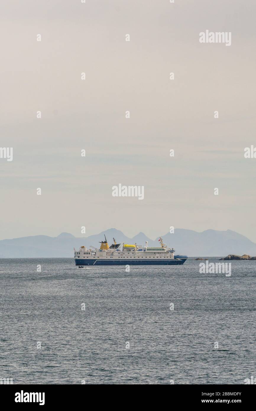 Cruise Ship Ocean Nova at anchor at the mouth of Loch Boisdale with the ...