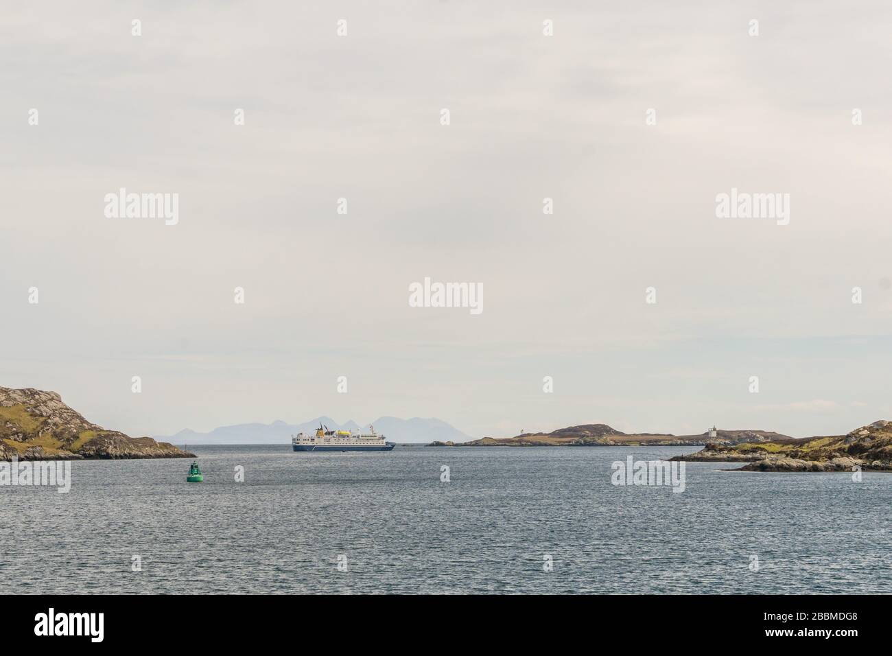 Cruise Ship Ocean Nova at anchor at the mouth of Loch Boisdale with the ...