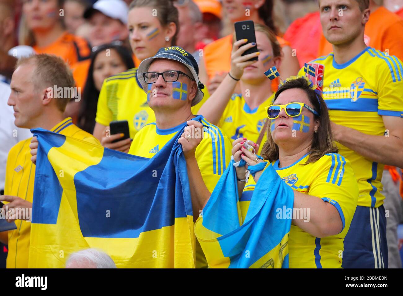 Sweden fans in the stands Stock Photo - Alamy