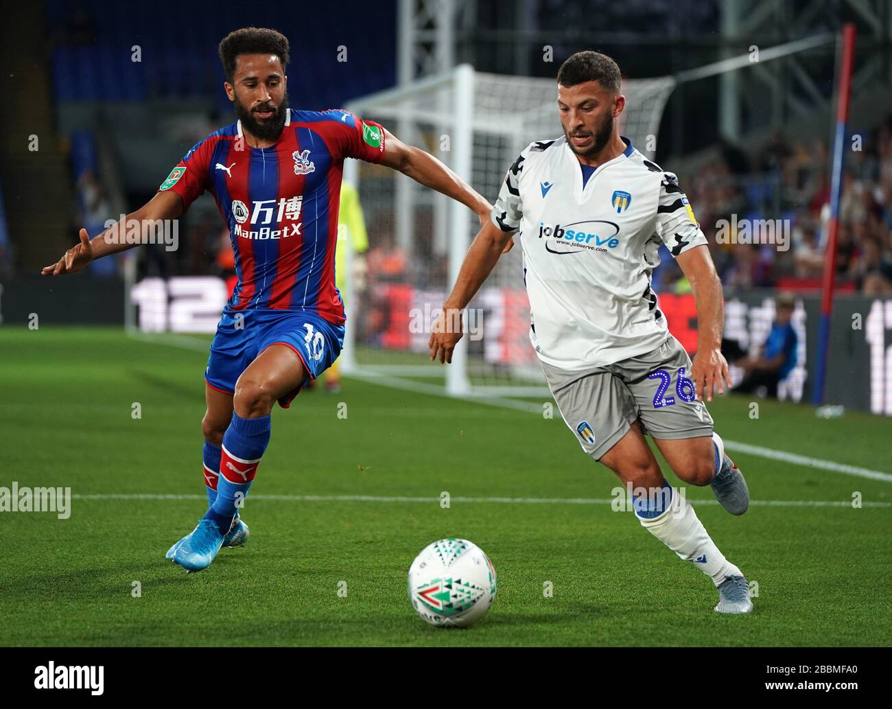 Crystal Palace's Andros Townsend (left) and Colchester's Luke Gambin ...