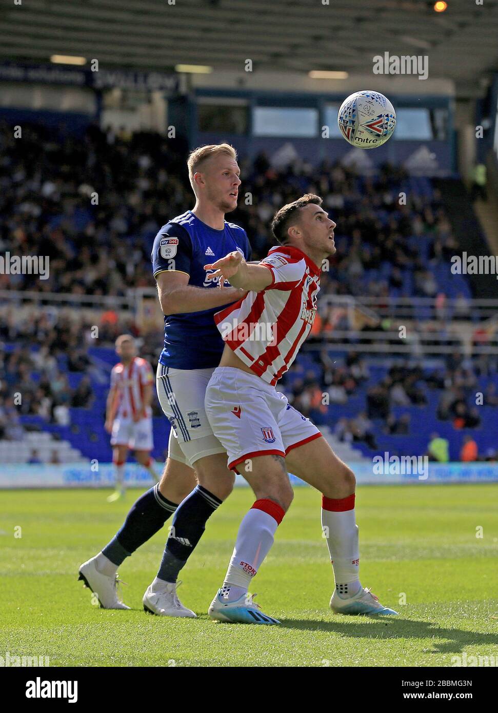 Birmingham City's Marc Roberts (Left) and Stoke City's Lee Gregory ...