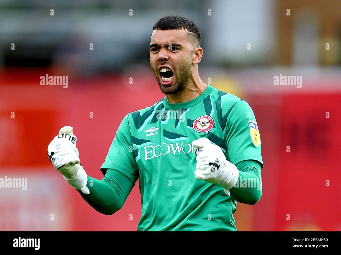 Brentford goalkeeper David Raya celebrates as team mate Ollie Watkins ...