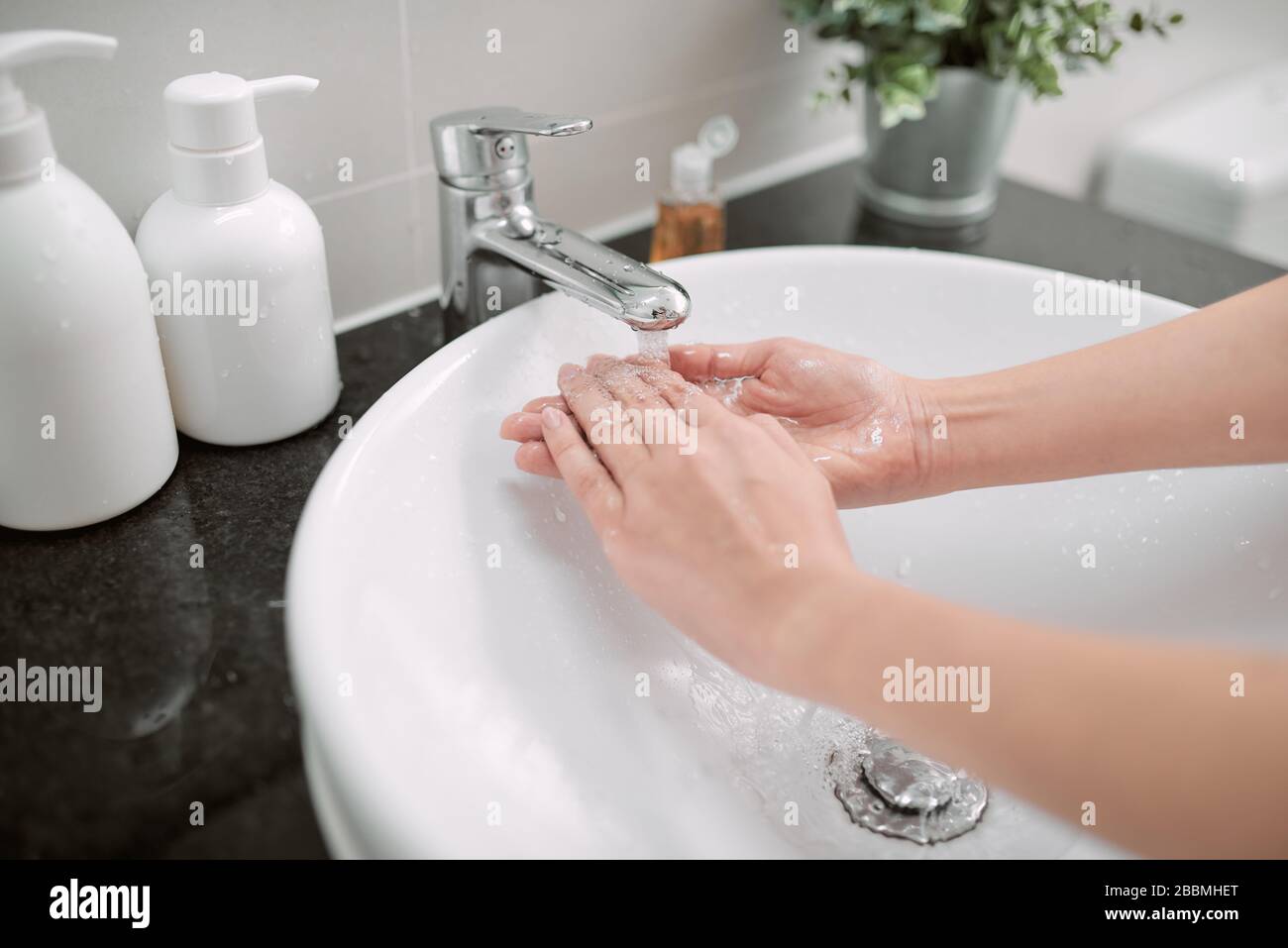 Handwashing. woman washing hands under a tap water,Washing Hands with ...