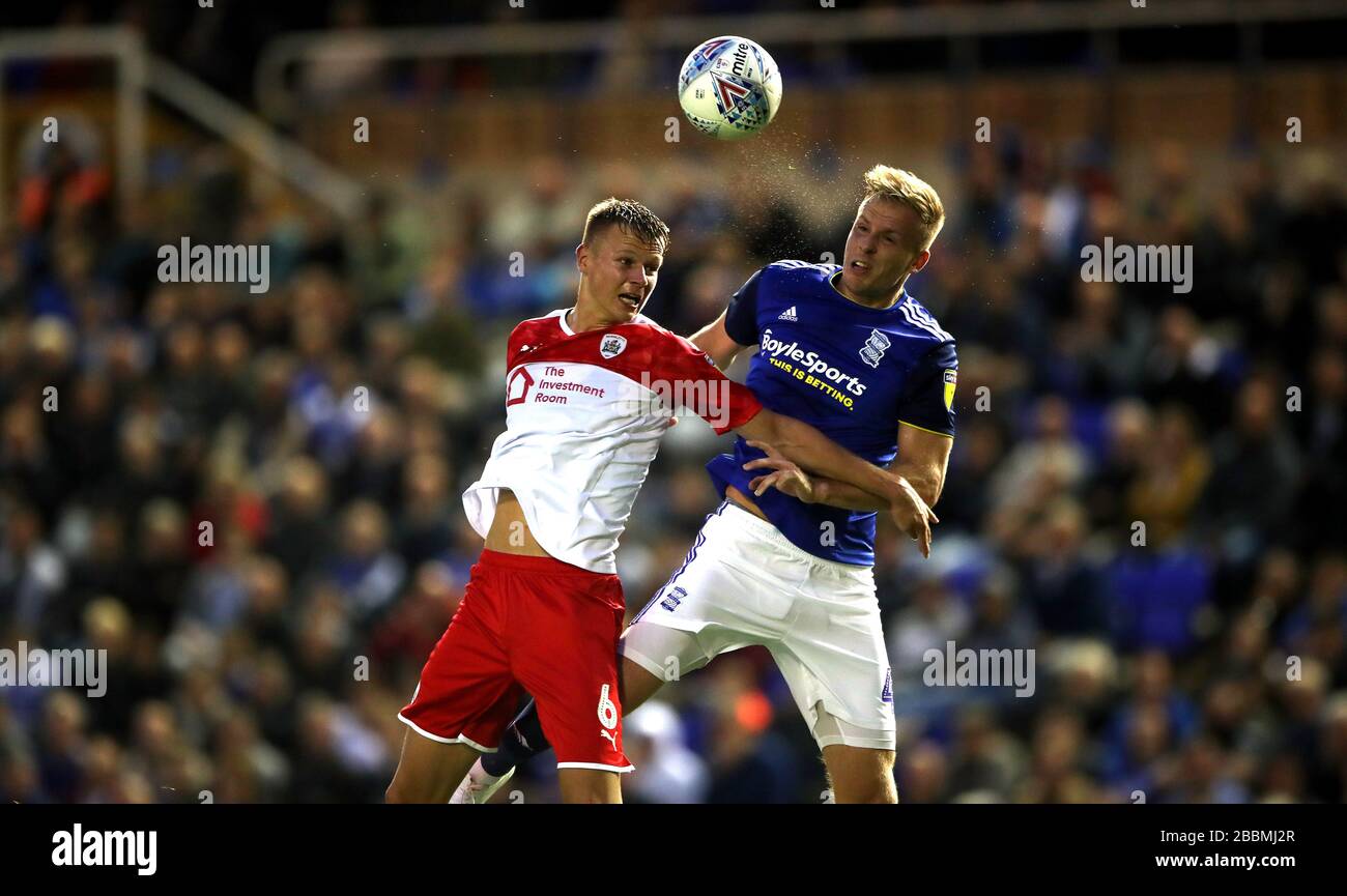 Barnsley's Mads Andersen (left) and Birmingham City's Marc Roberts ...