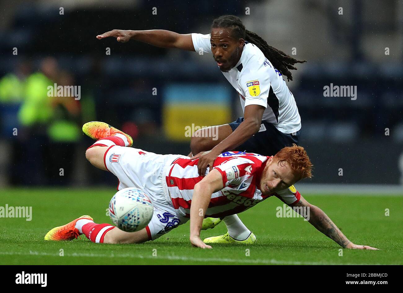 Preston North End's Daniel Johnson (left) and Stoke City's Ryan Woods ...