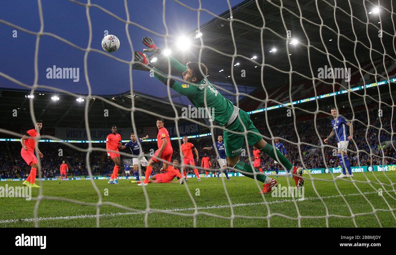 Cardiff City's Joe Ralls beats Huddersfield Town's goalkeeper Kamil ...