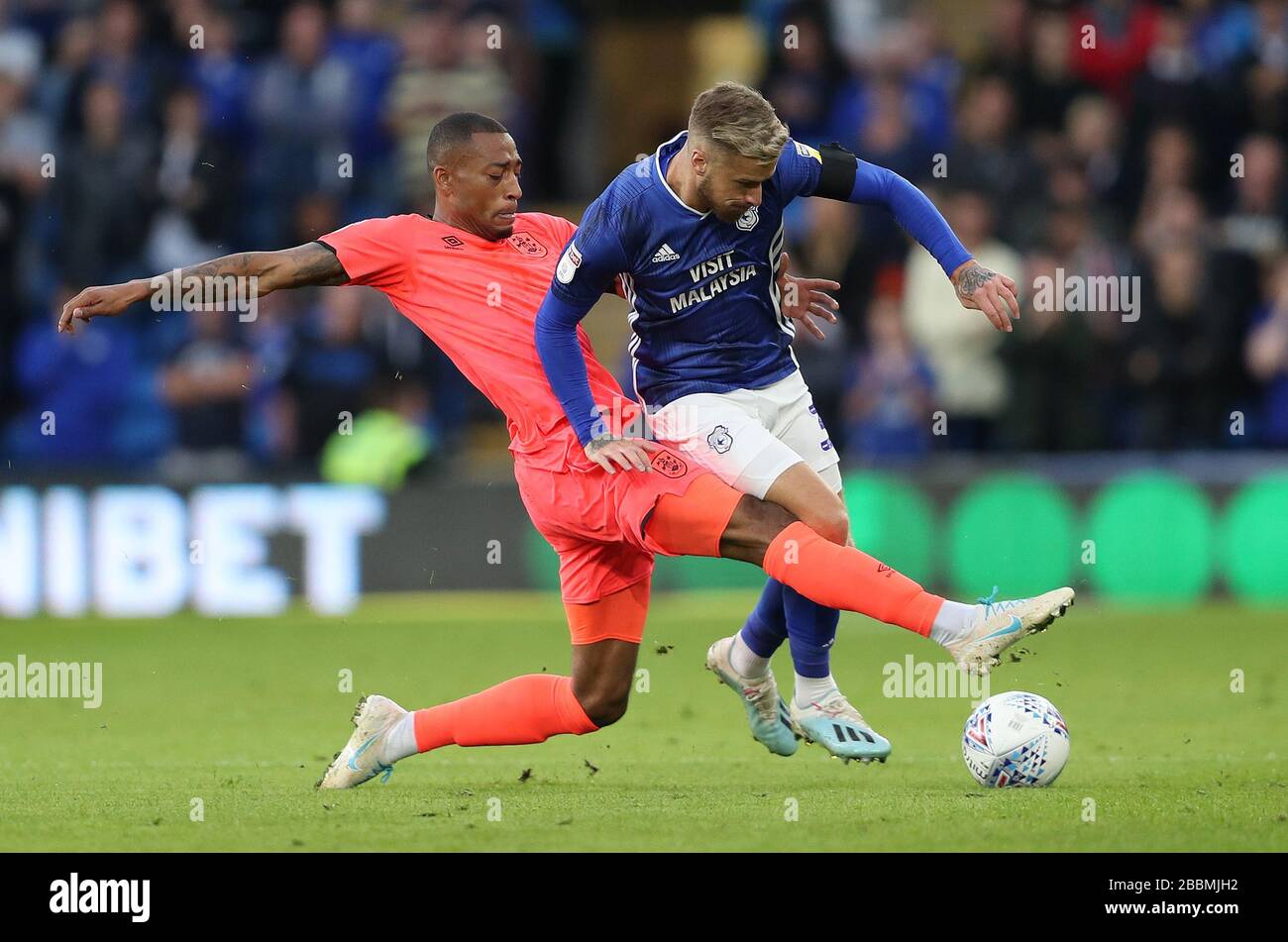 Cardiff City's Joe Bennett and Huddersfield Town's Rajiv Van La Parra ...