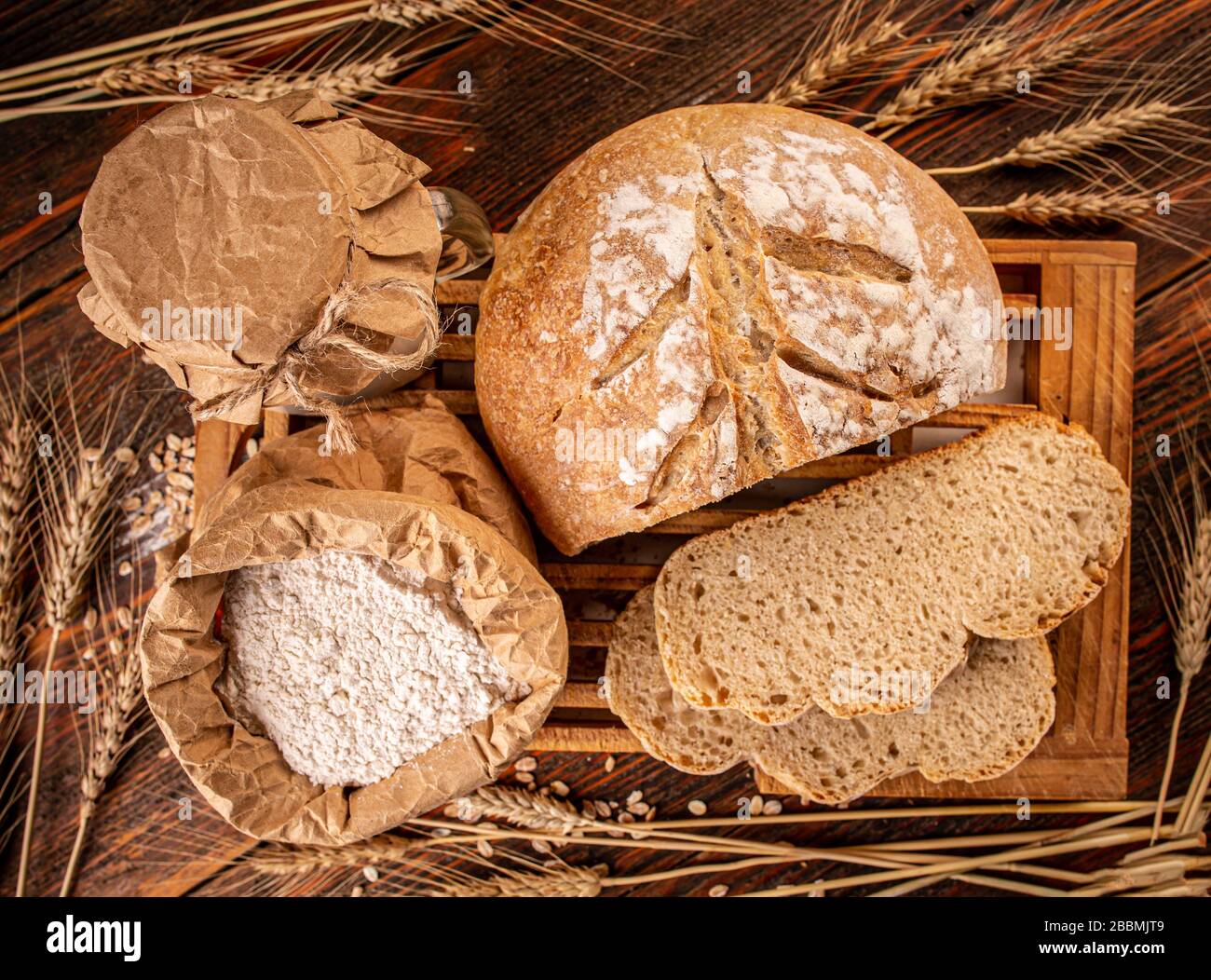 Crusty homemade artisan round wheat sourdough bread loaf Stock Photo ...