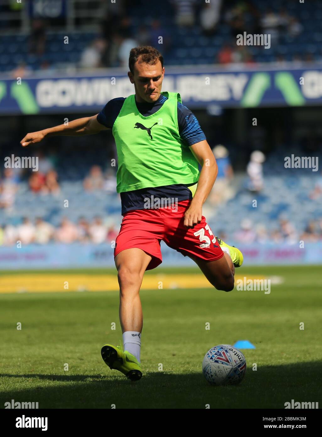 Wigan Athletic's team warm up ahead of the game against Queens Park ...