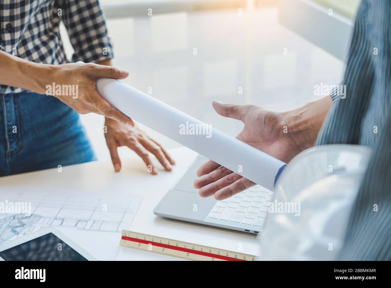 engineer Hand Drawing Plan On Blue Print with architect equipment ...