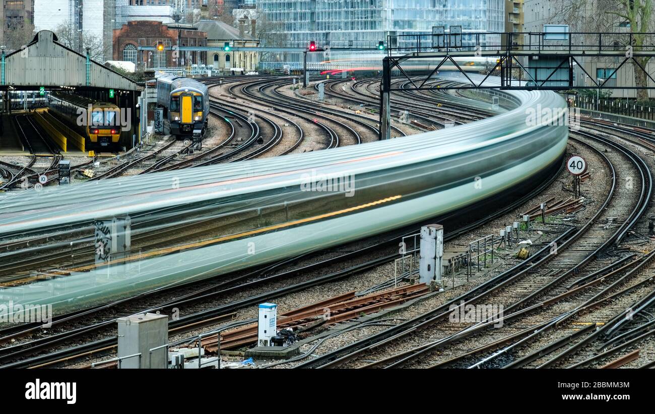 Motion blurred trains on railway tracks Stock Photo - Alamy
