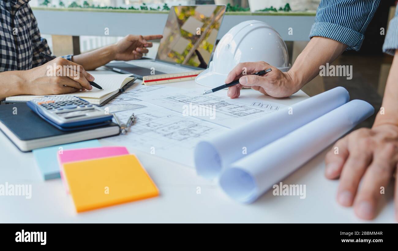engineer Hand Drawing Plan On Blue Print with architect equipment ...