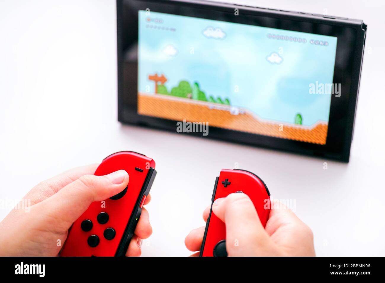 Tambov, Russian Federation - December 27, 2019 Kid with Joy-Cons ...