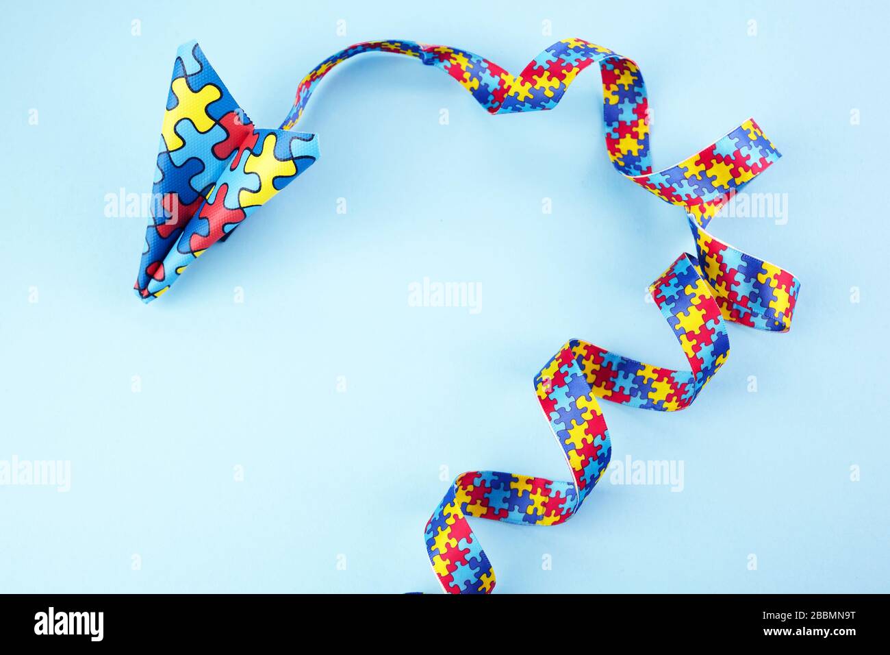 Autism awareness day or month. Paper plane in origami style with autism ...