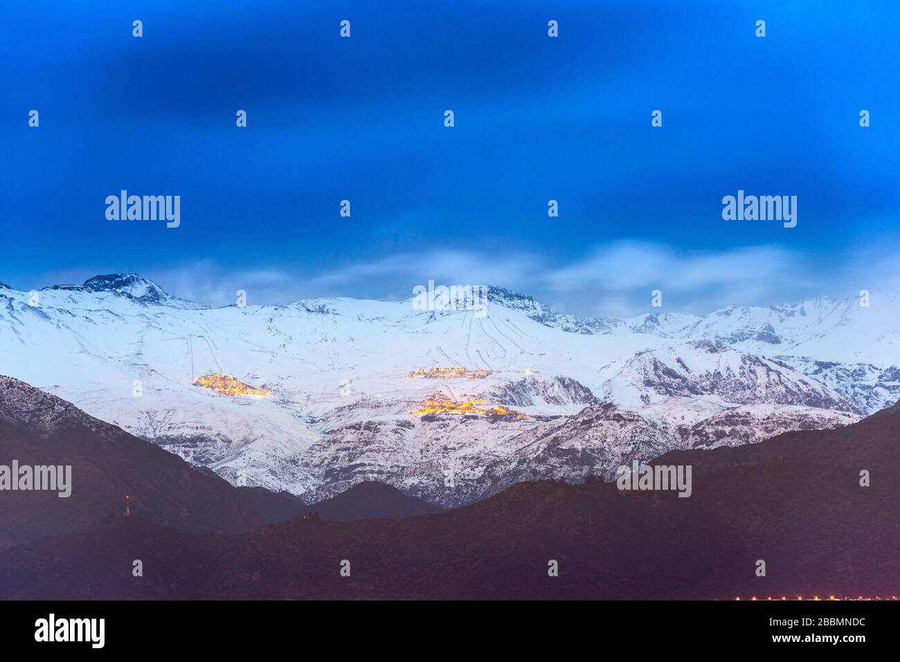 A distant view of the Ski villages over Santiago in the Andes Mountain ...