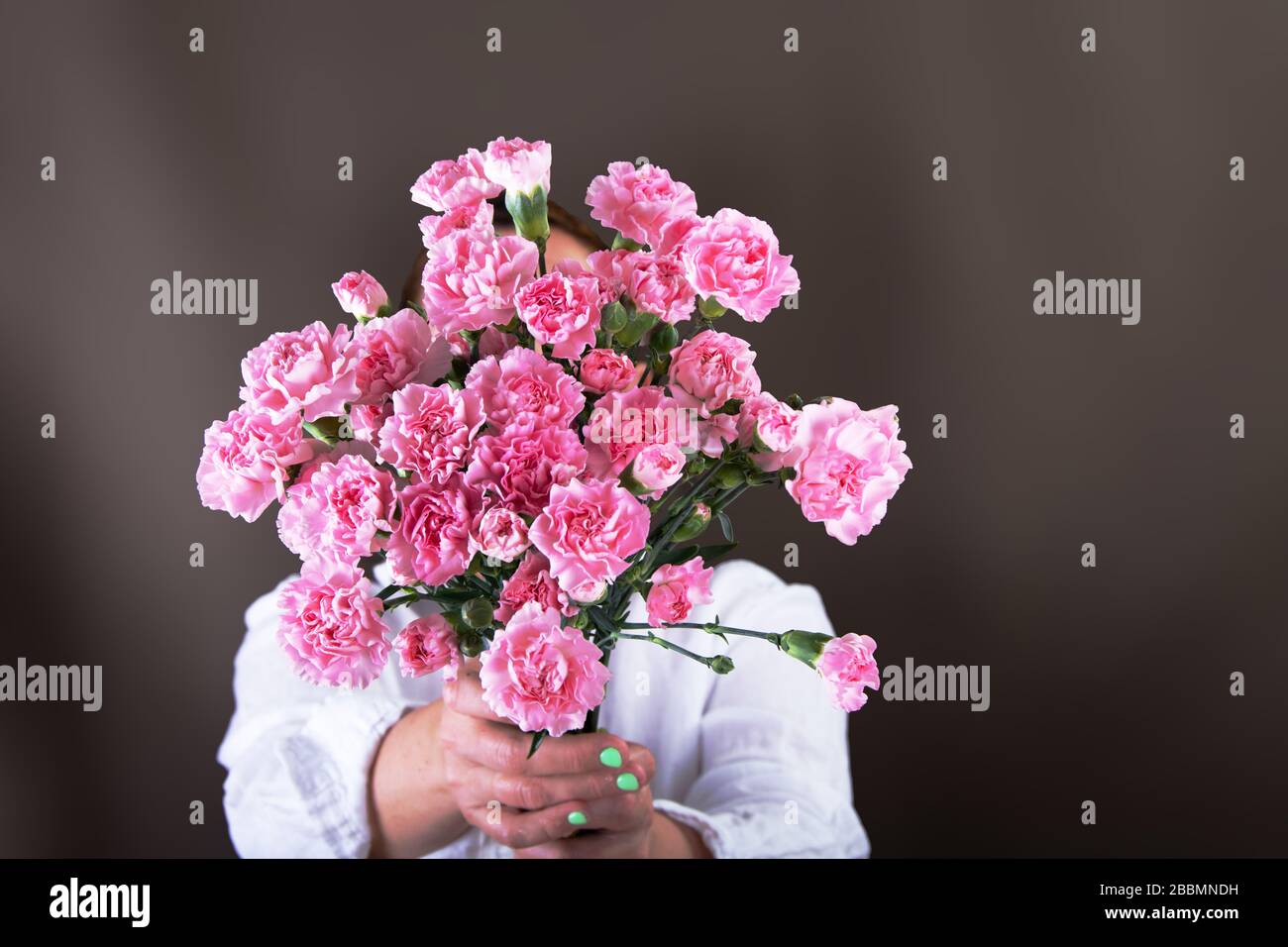 Girl Hiding Face With Flower