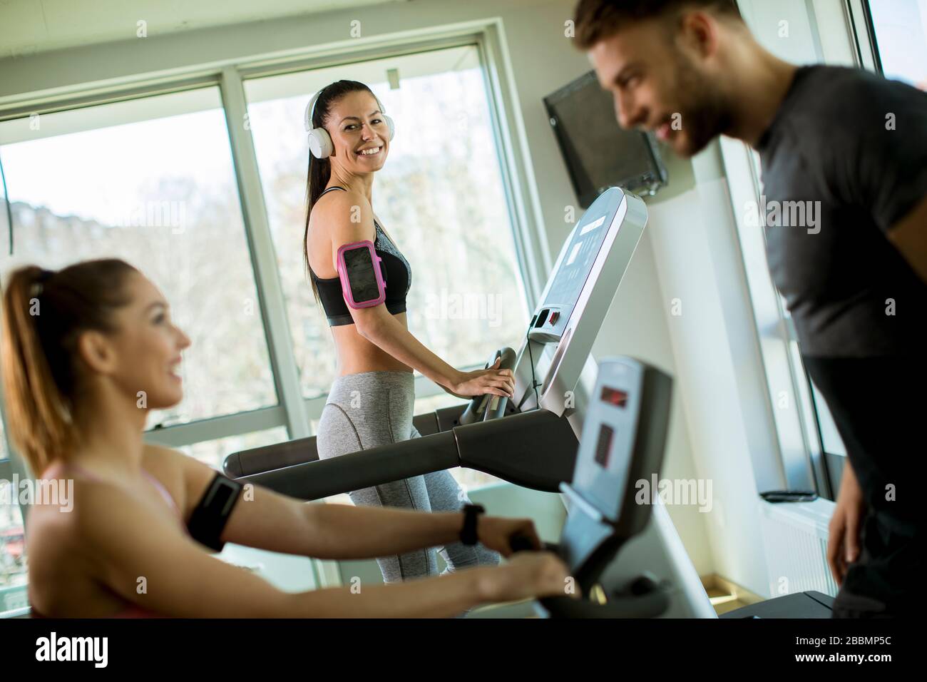 Woman using treadmill hi-res stock photography and images - Alamy