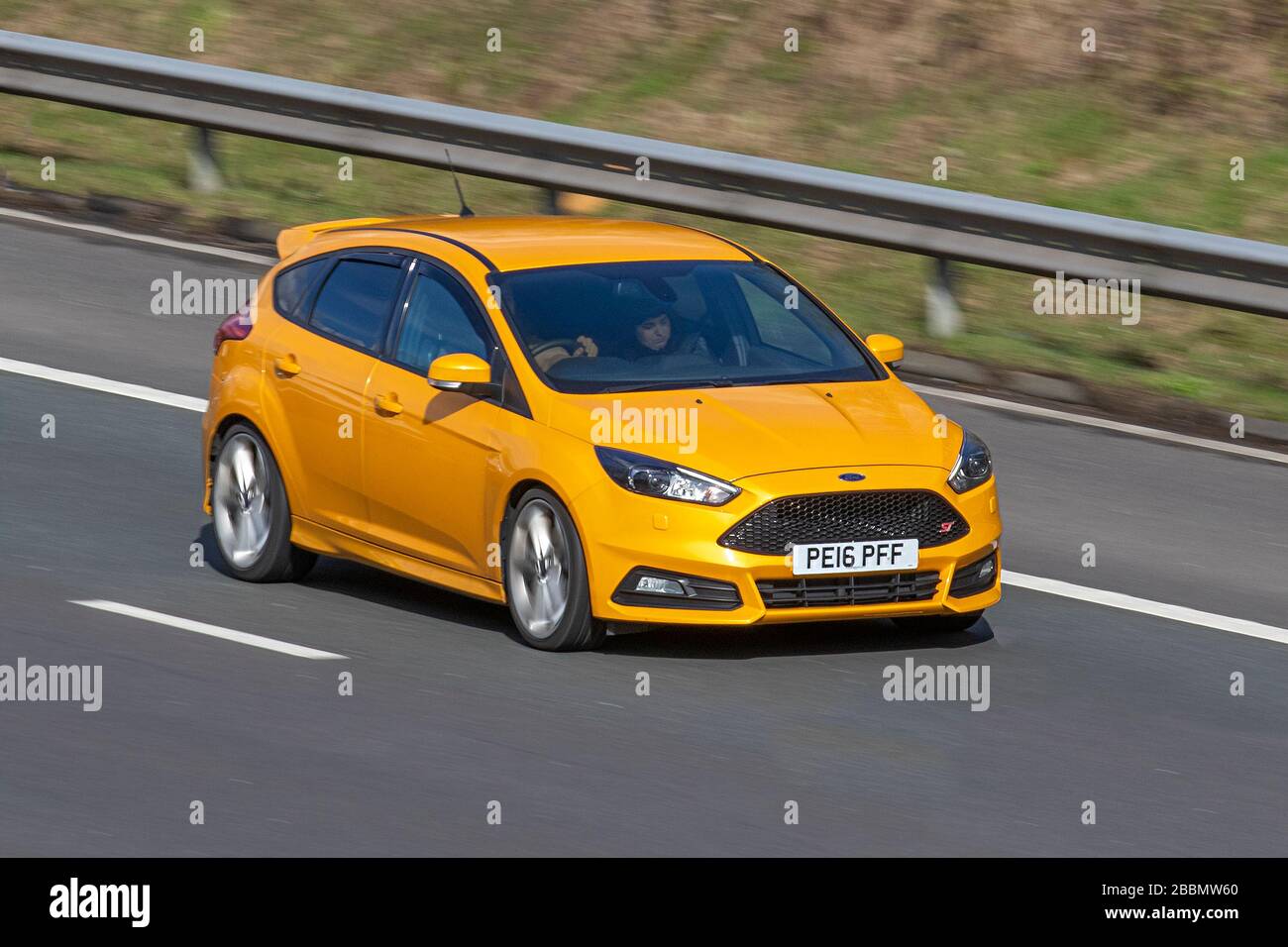 2016 yellow Ford Focus St-3 Turbo; Vehicular traffic moving vehicles ...