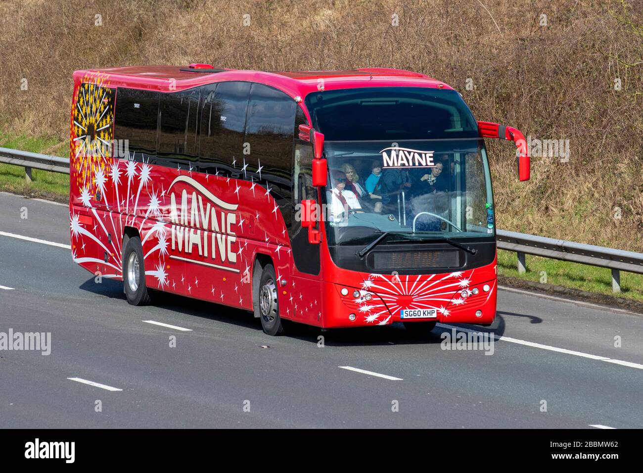 MAYNE Mayne red buses, 2019 Volvo coaches, coach on the M6 motorway ...