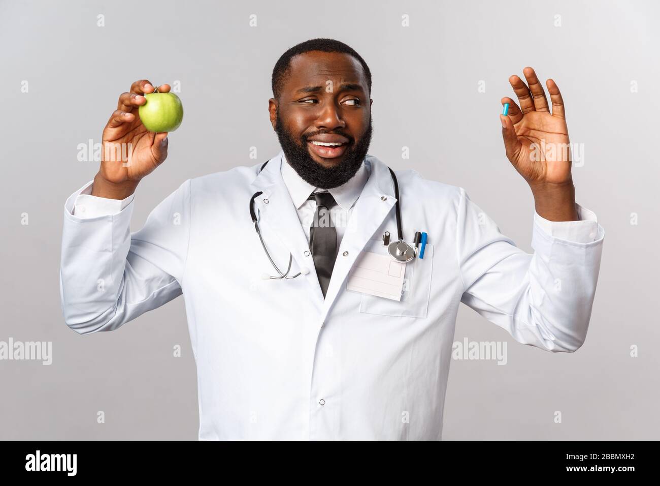 Healthcare, medicine and healthy lifestyle concept. Skeptical handsome ...