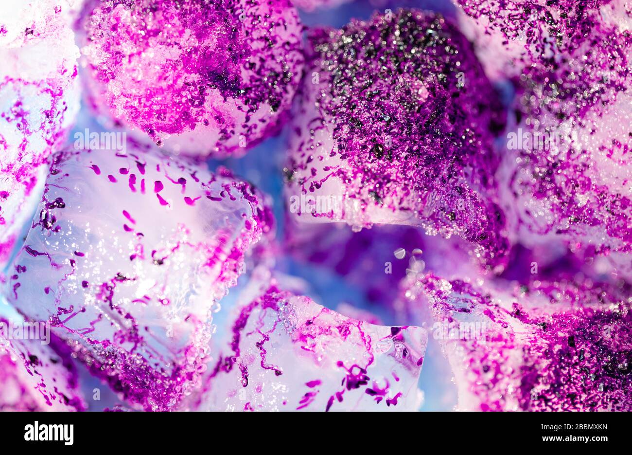 Blue, purple and magenta colorful patches. Potassium permanganate ...