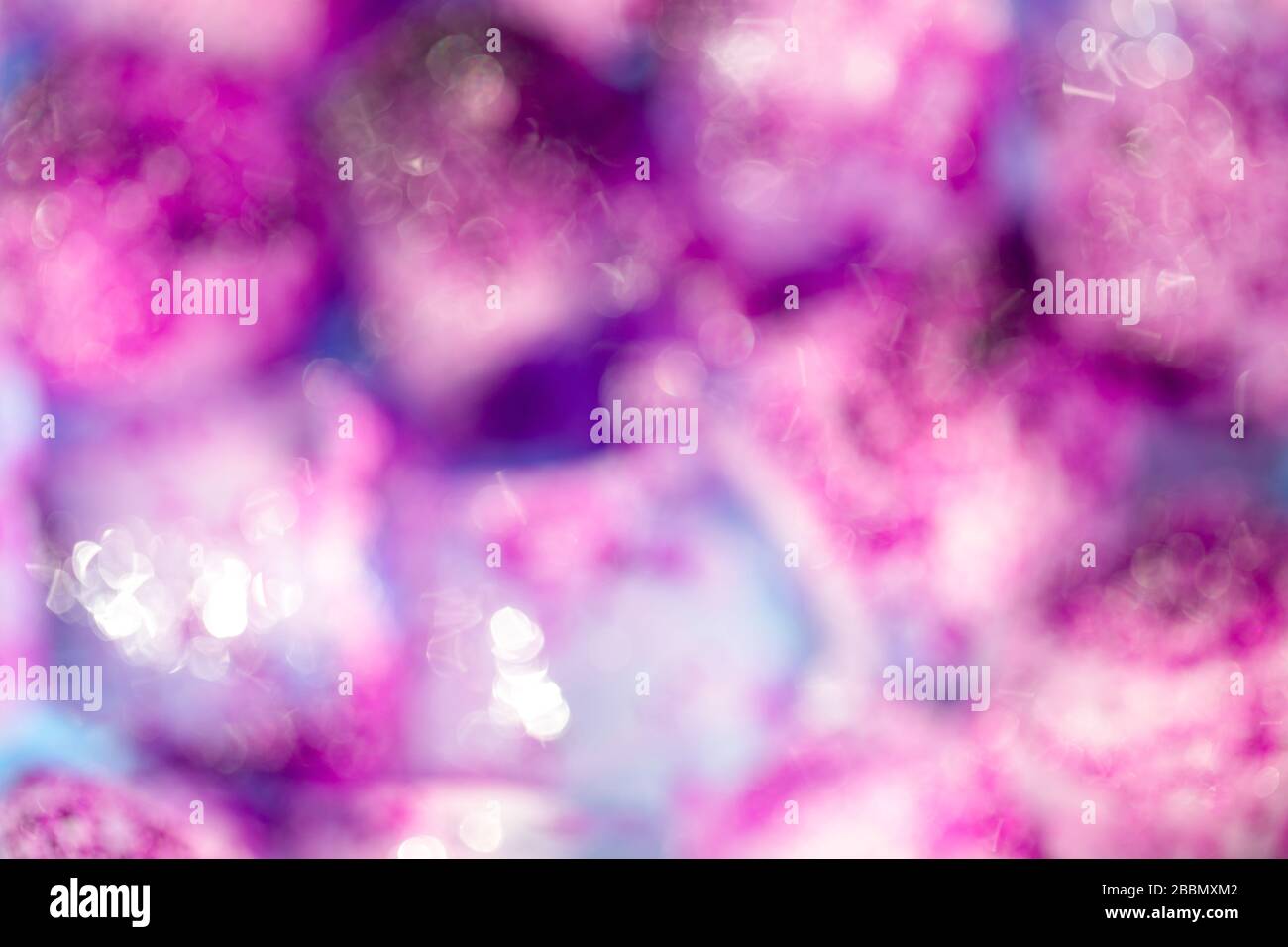 Blue, purple and magenta colorful patches. Potassium permanganate ...