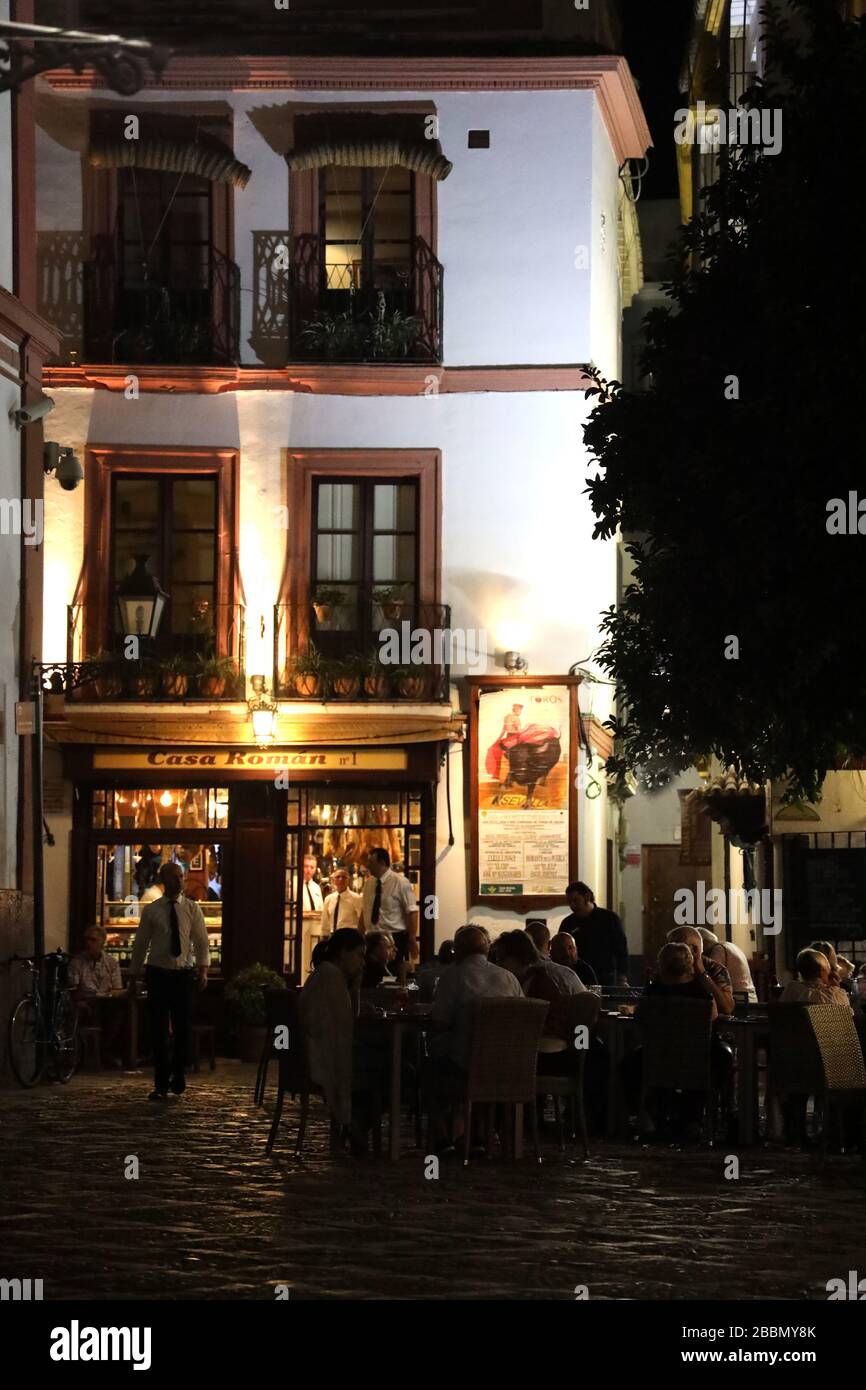Spanish street scene.Customers enjoying Casa Roman-Traditional, typical ...