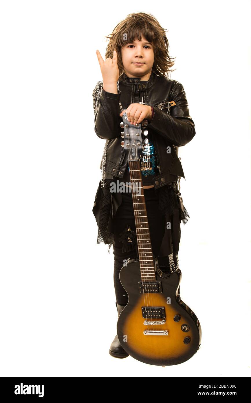 Beauty rocker boy with guitar showing rock sign isolated on white ...