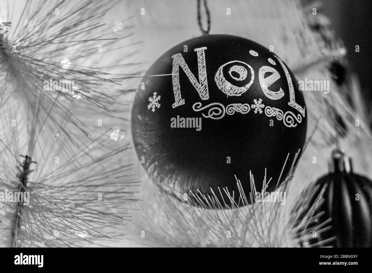 Glass ball on tree Black and White Stock Photos & Images - Alamy
