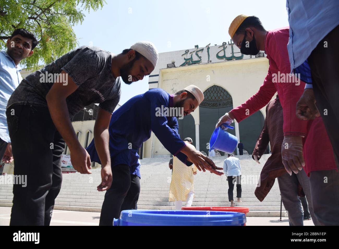 People washing hands with anti-bacterial soap as a precautionary step ...