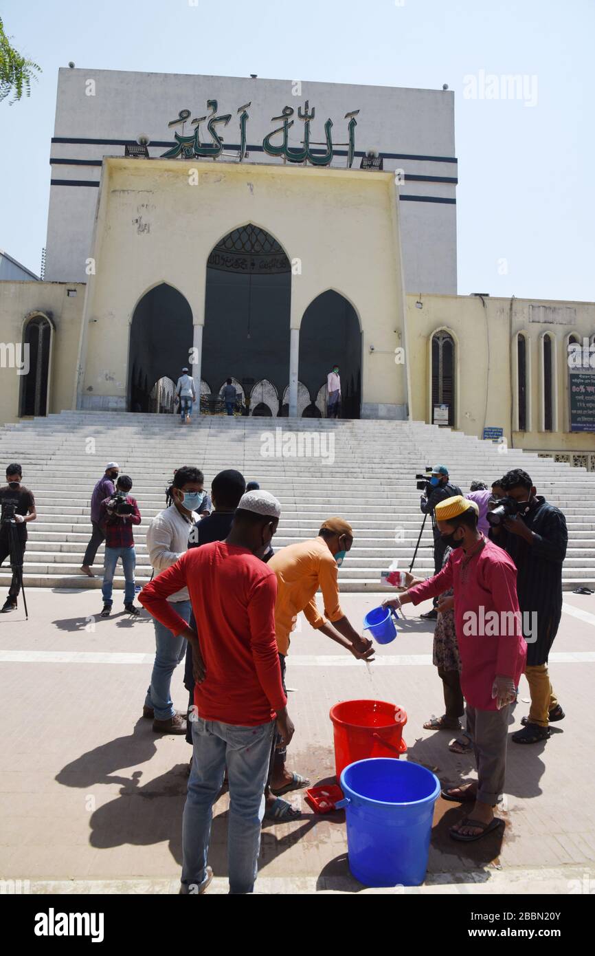 People washing hands with anti-bacterial soap as a precautionary step ...