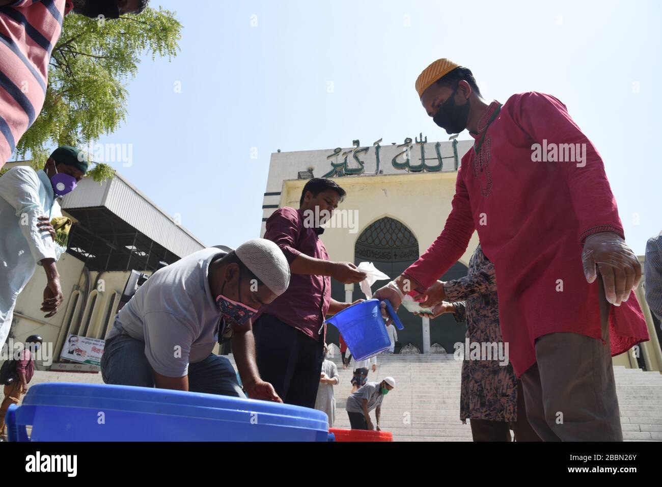 People washing hands with anti-bacterial soap as a precautionary step ...