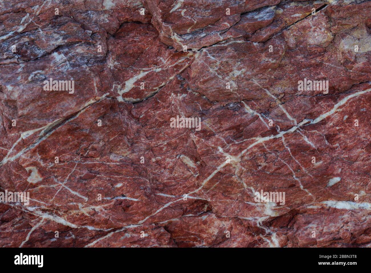 Red marble stone texture, nature abstract background. Close-up of a red ...