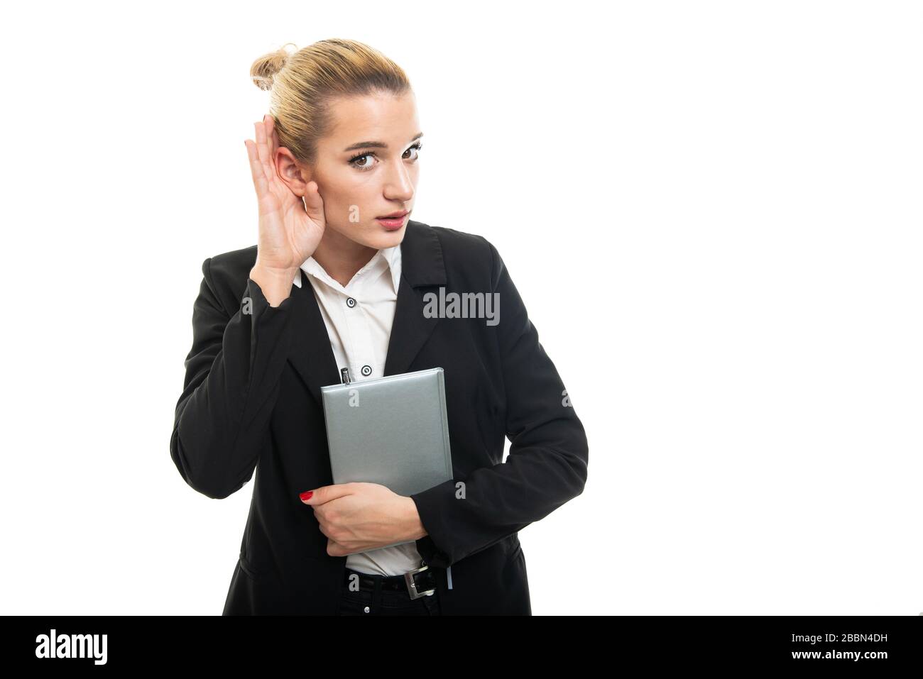 Female assistant manager holding agenda making can't hear you gesture ...
