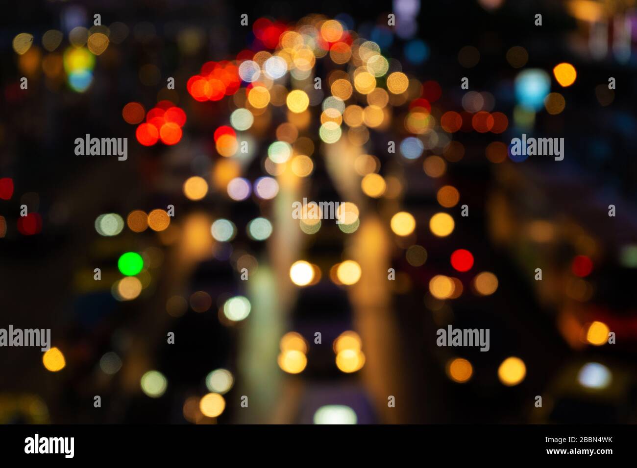 Blurred footage. Traffic jam on a wide street. Blurry brake lights ...