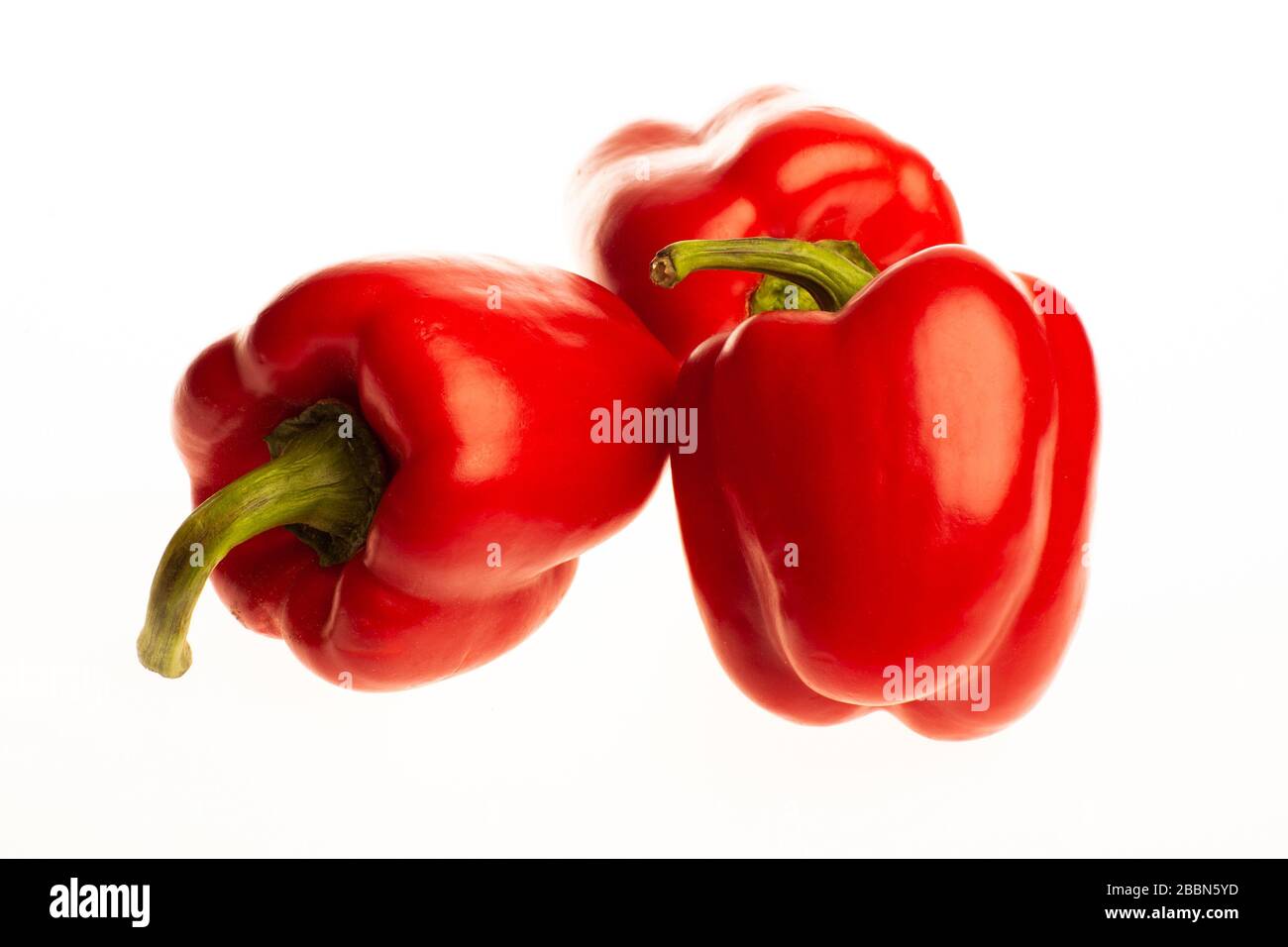 Red paprika isolated on white background. Composition Stock Photo - Alamy