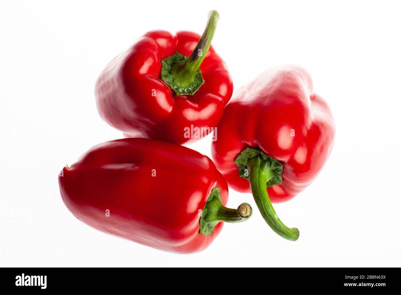 Red paprika isolated on white background. Composition Stock Photo - Alamy