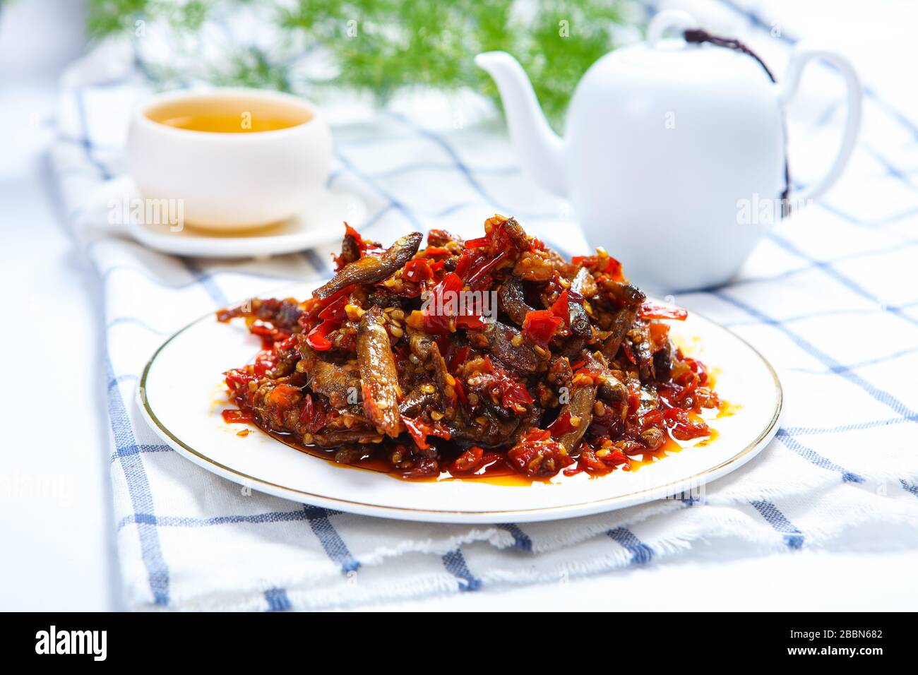 Under the food dry chilli fish Stock Photo - Alamy